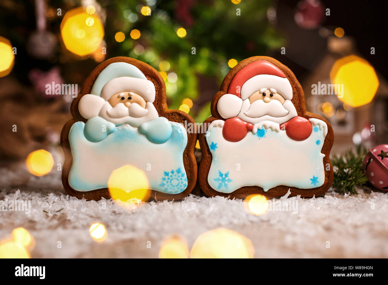 Holiday traditional food bakery. Two gingerbread of santa claus with ...