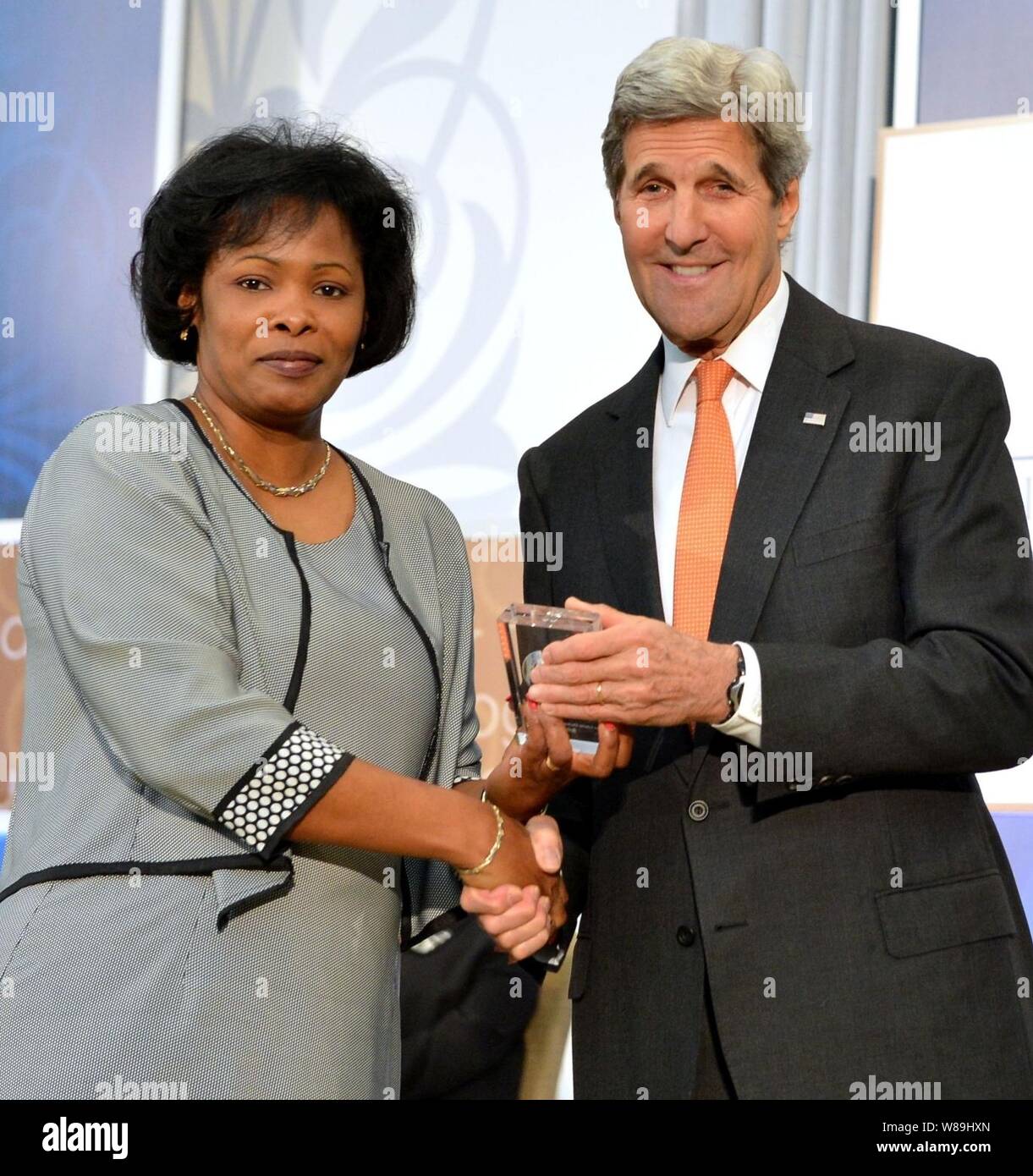 Debra Baptist-Estrada of Belize and U.S. Secretary of State John Kerry ...