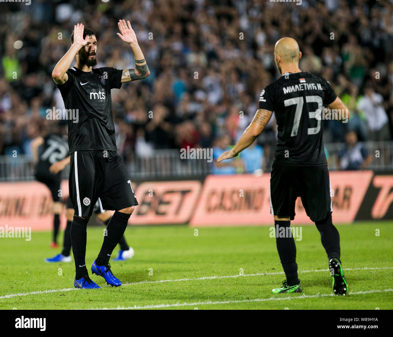 Scekic of Partizan celebrates the victory with N.Miletic of Partizan ...
