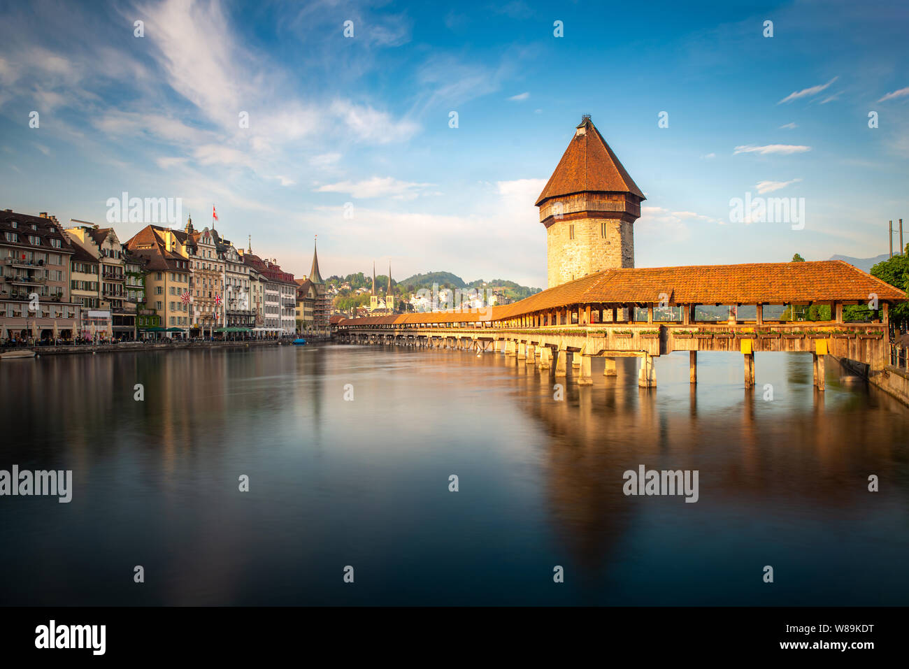 Sunset in historic city center of Lucerne with famous Chapel Bridge and ...