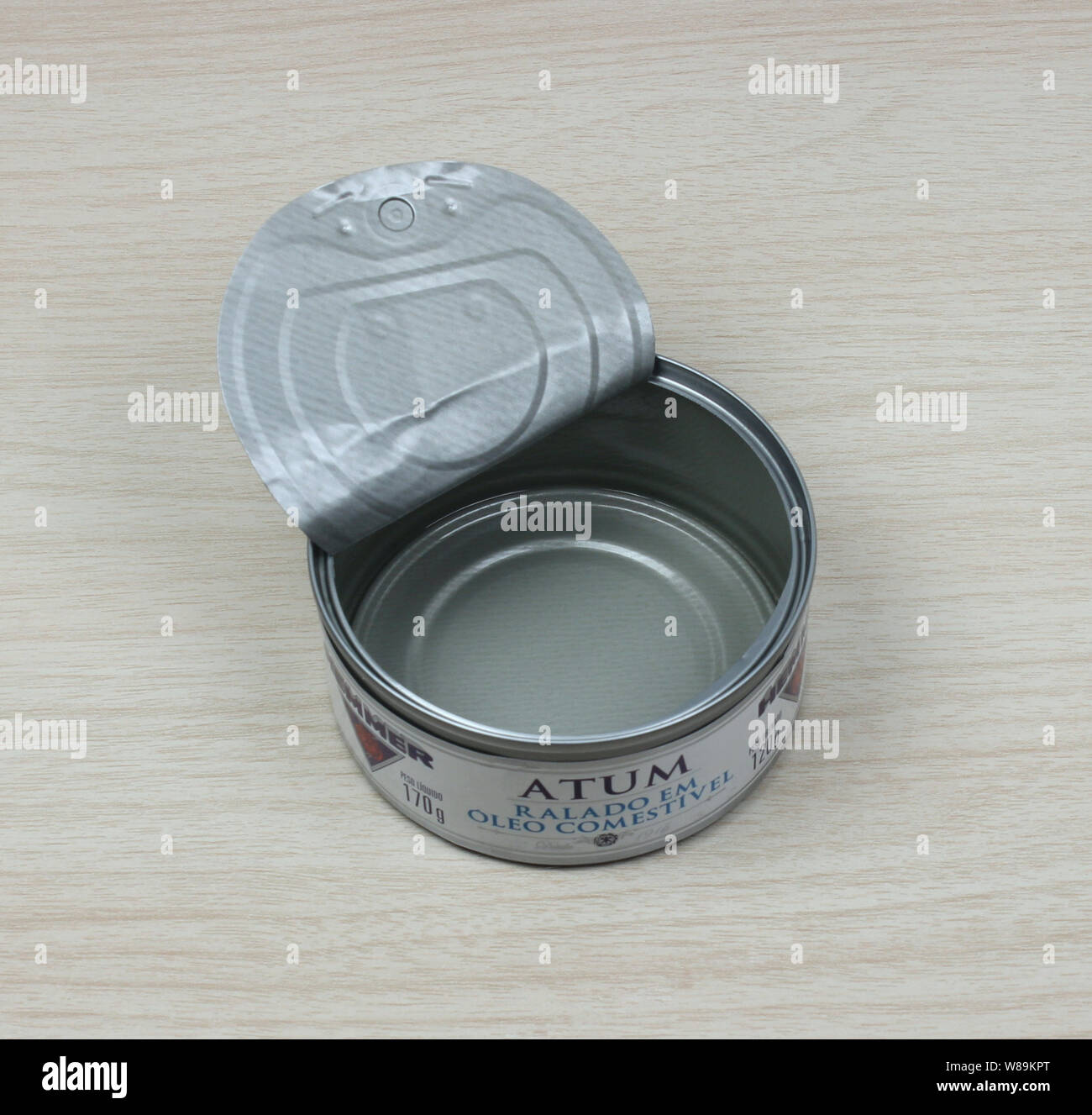 Tuna tin grey background - 1 Stock Photo - Alamy