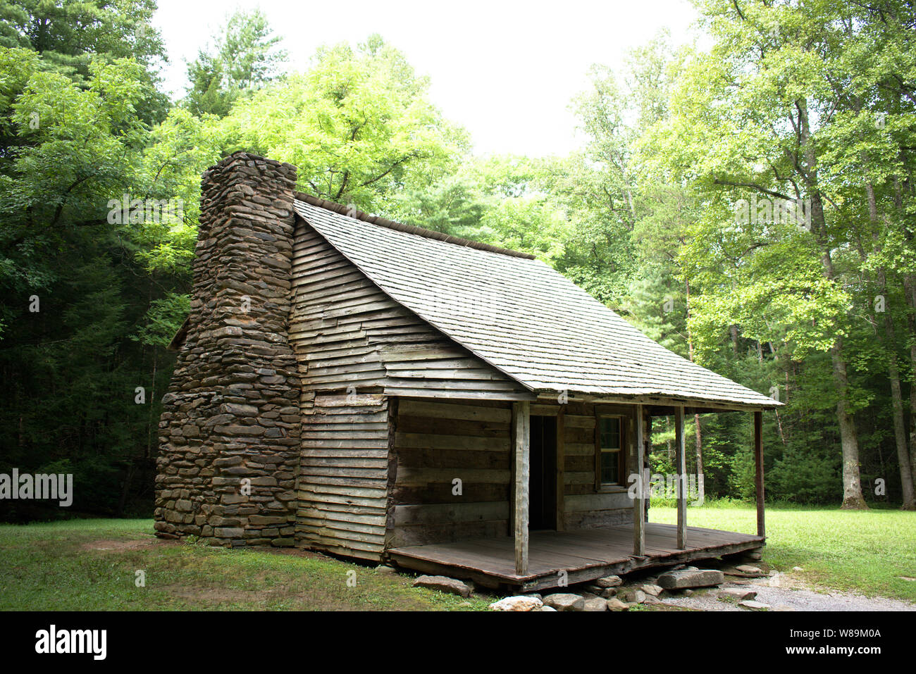 Old stack stone chimney Stock Photo - Alamy