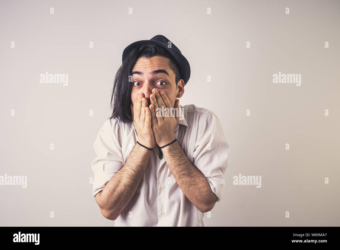 Portrait of Hispanic man with surprise face, isolated on white Stock ...