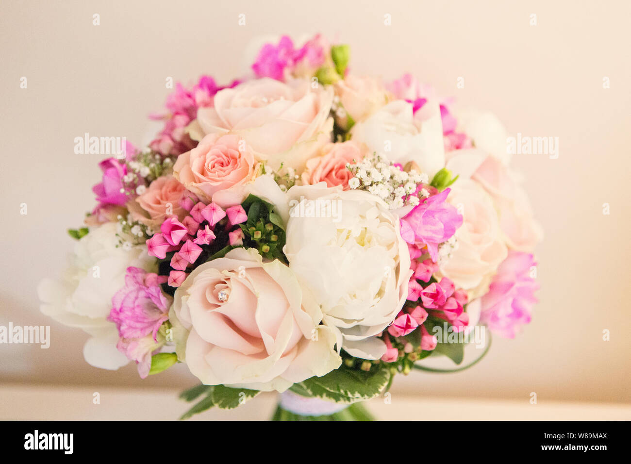 Bridal Bouquet - White & Pink Roses, Peonies and Freesias Stock Photo ...