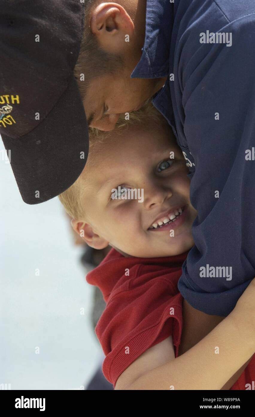 Navy Petty Officer 2nd class Tom Mitchell says goodbye to his son ...