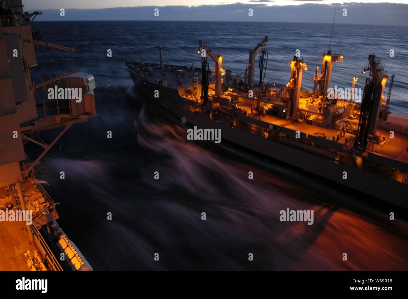 The underway replenishment oiler USNS Guadalupe (T-AO 200) pulls ...