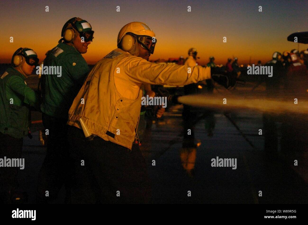 Flight deck aircraft fire drill hi-res stock photography and images - Alamy