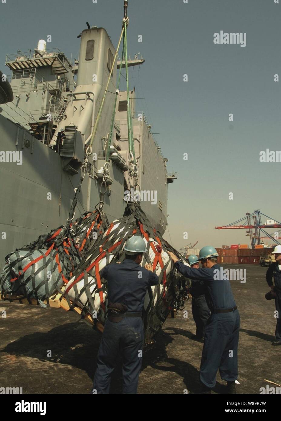 Disaster relief unload boat hi-res stock photography and images - Alamy