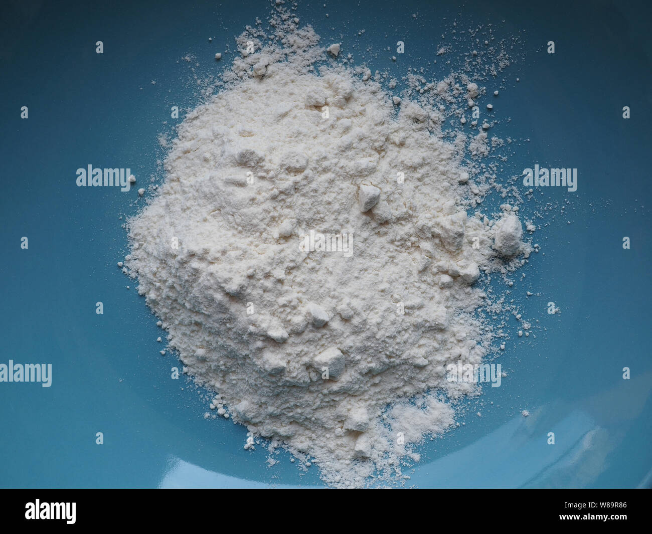 white cereal flour powder in a dish Stock Photo - Alamy