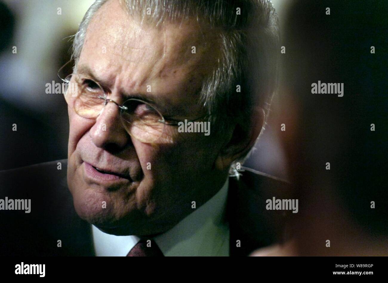 Secretary of Defense Donald H. Rumsfeld talks to some of the other ...