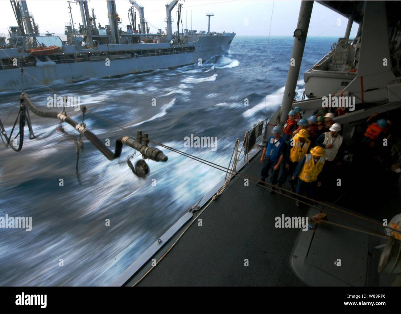 Sailors aboard the amphibious command ship USS Blue Ridge (LCC 19 ...