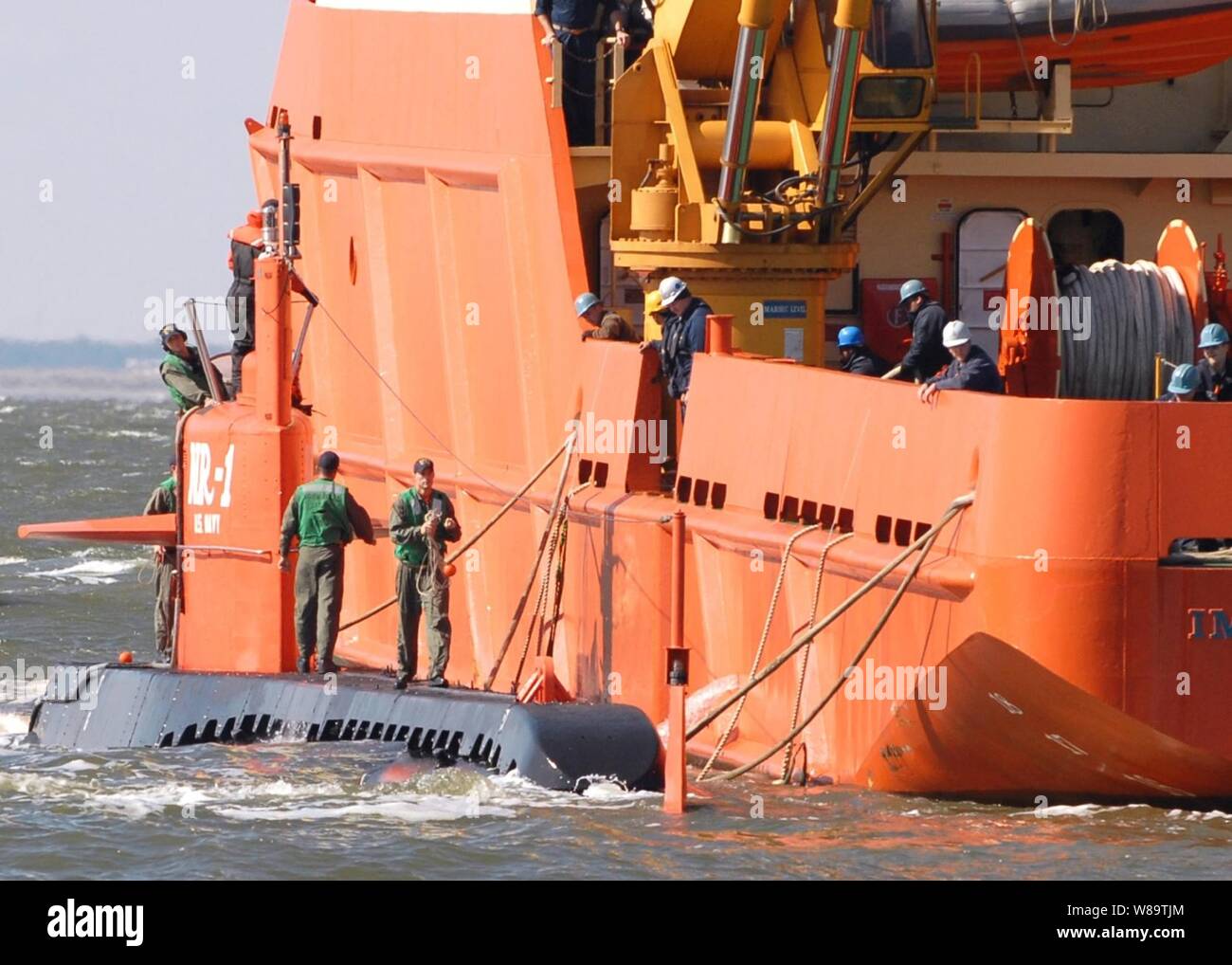 The Naval research submarine NR-1 docks alongside the submarine support ...
