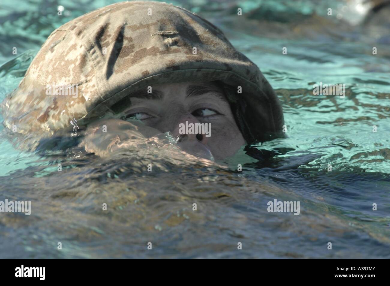 A U.S. Marine from Golf Company, 2nd Battalion, 1st Marine Regiment ...
