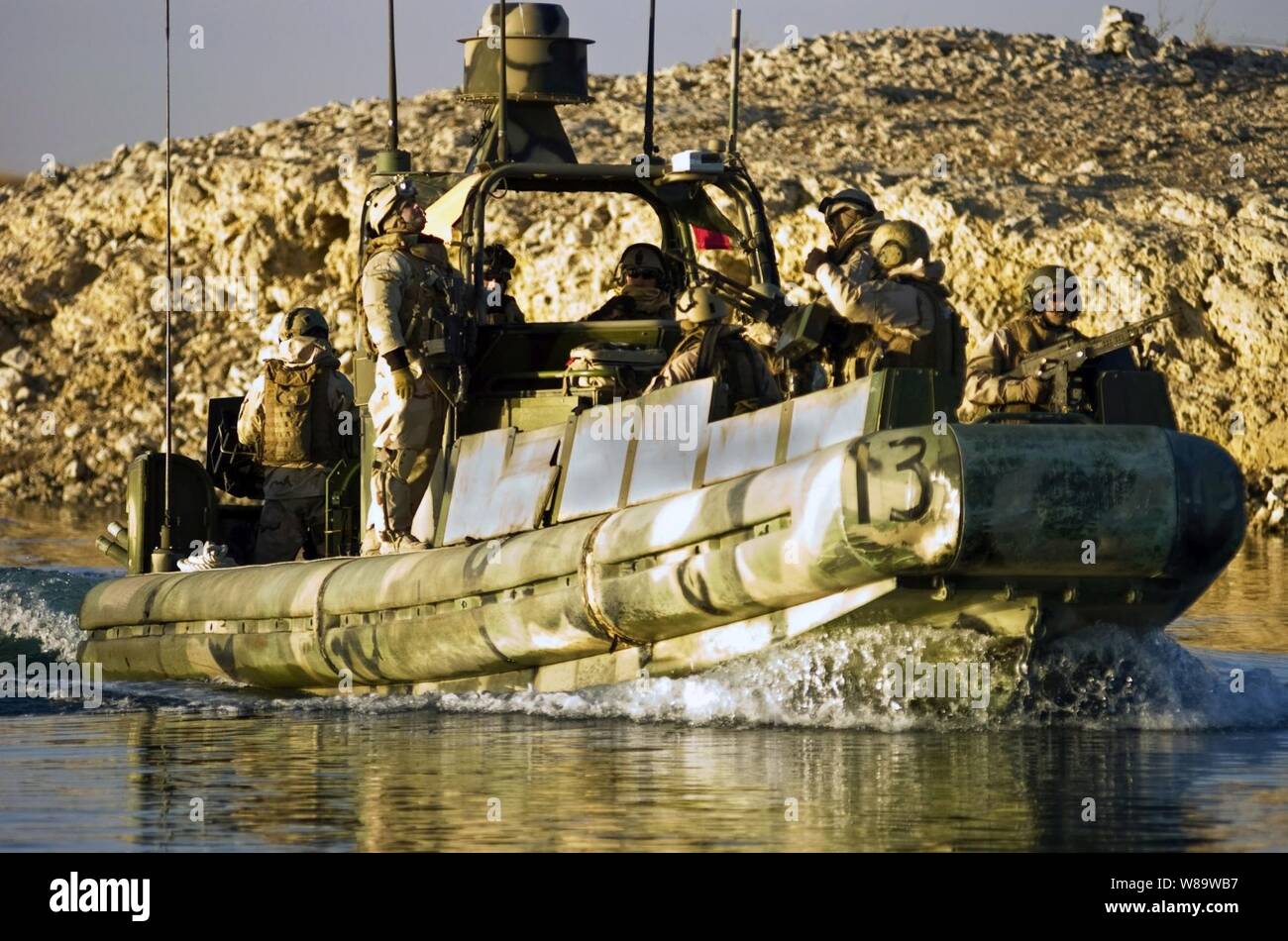 U.S. Navy sailors patrol the waterways of the Haditha Dam Forward ...