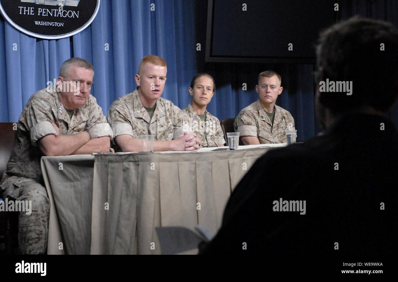 U.S. Marine Lt. Col. Paul Rock (2nd from left) answers a reporter's ...