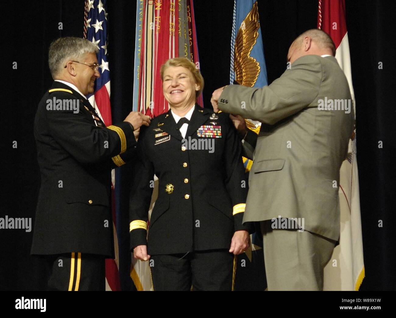 U.S. Army Lt. Gen. Ann E. Dunwoody (center) smiles as Chief of Staff of ...
