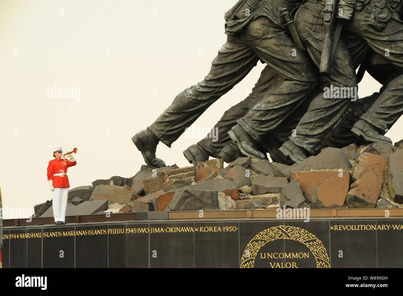 The bugler with the U.S. Marine Corps Band plays taps during the first ...