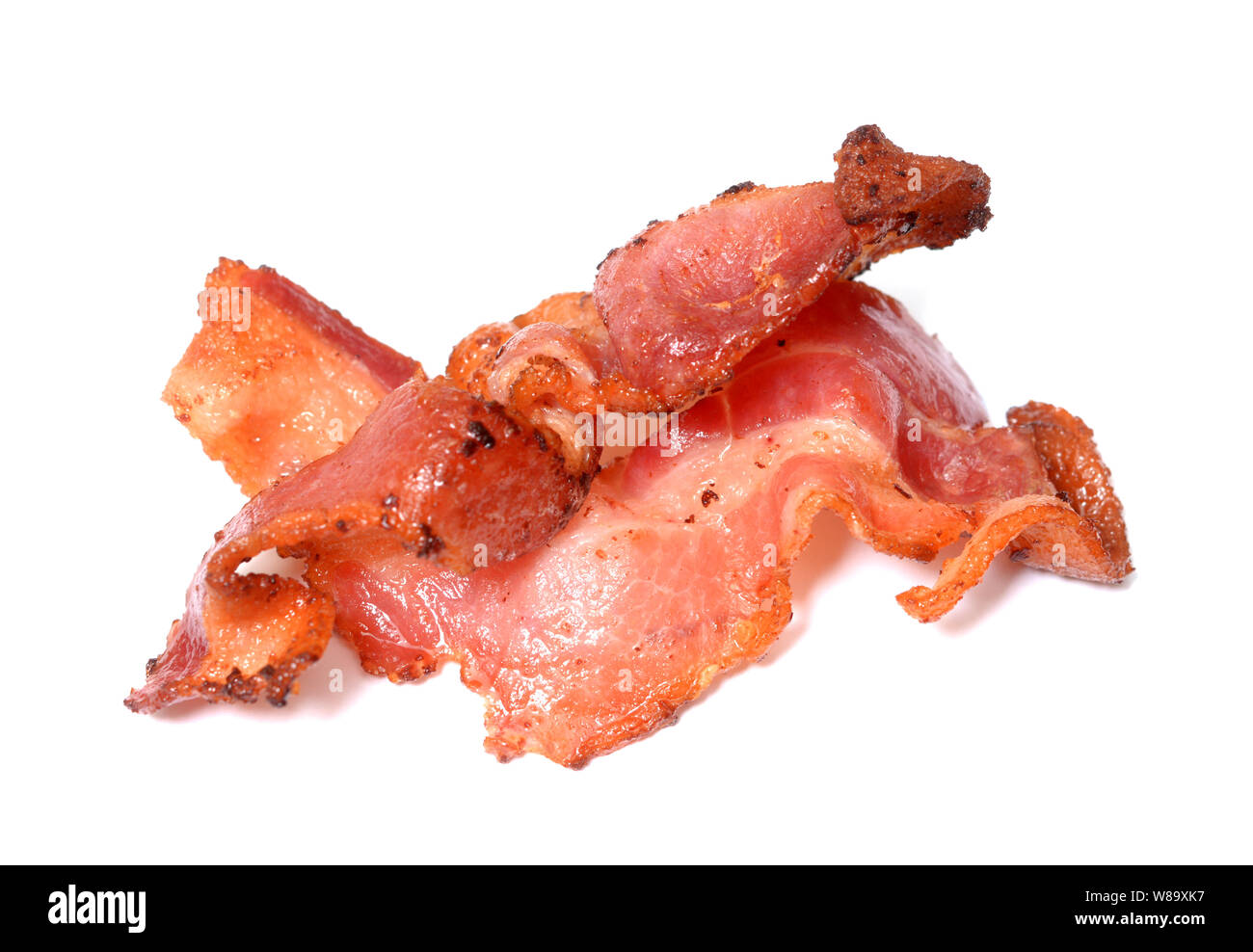 Two fried Bacon strip on white background Stock Photo - Alamy