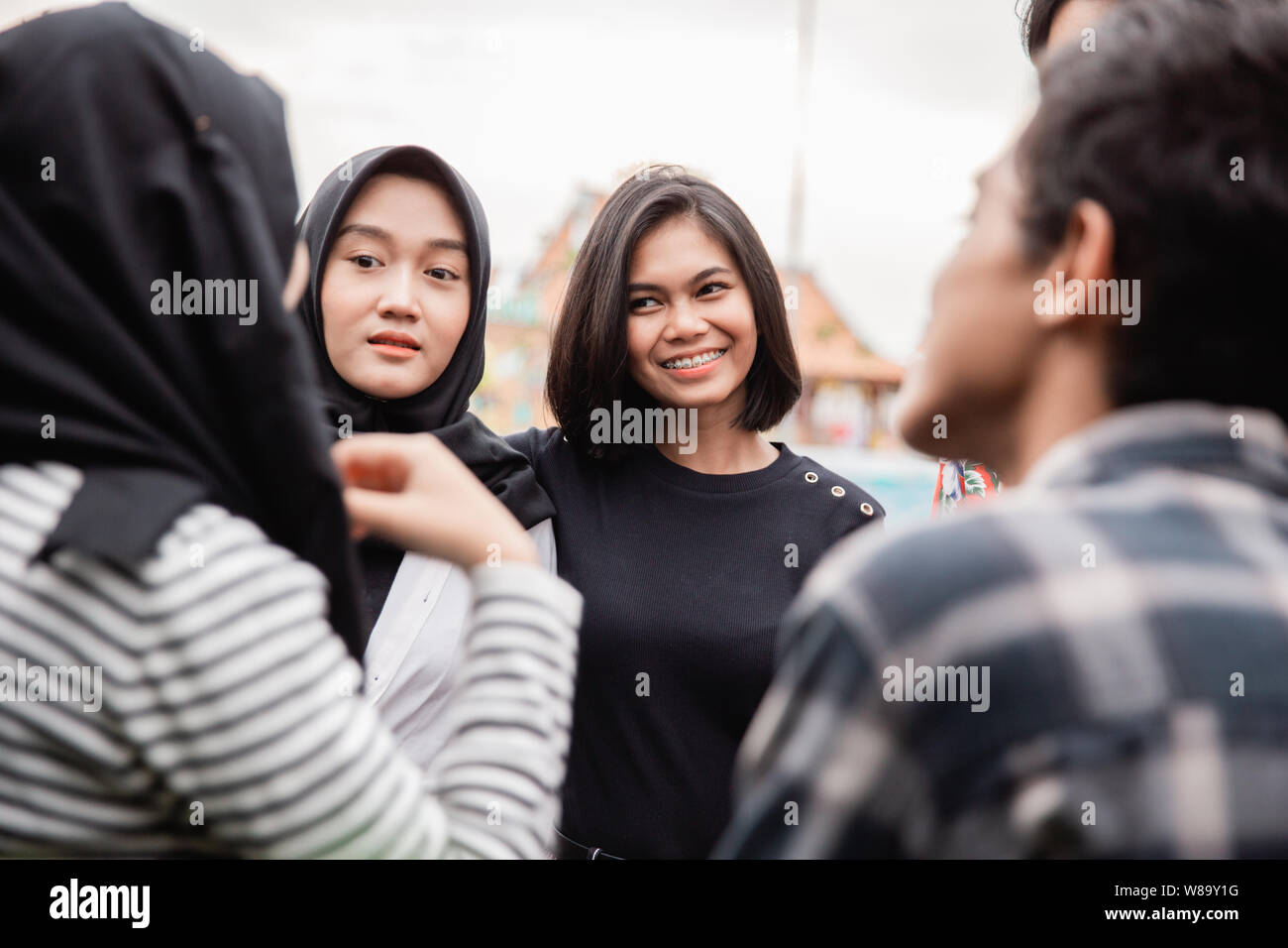friends telling joking together Stock Photo - Alamy
