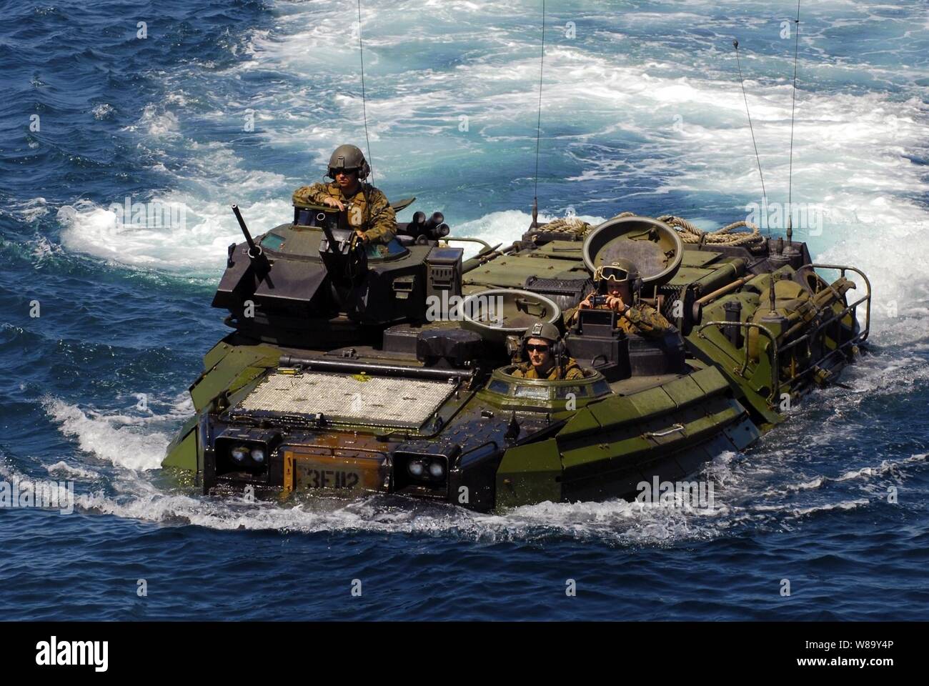 U.S. Marines from the 1st Battalion, 4th Marine Division return to the ...