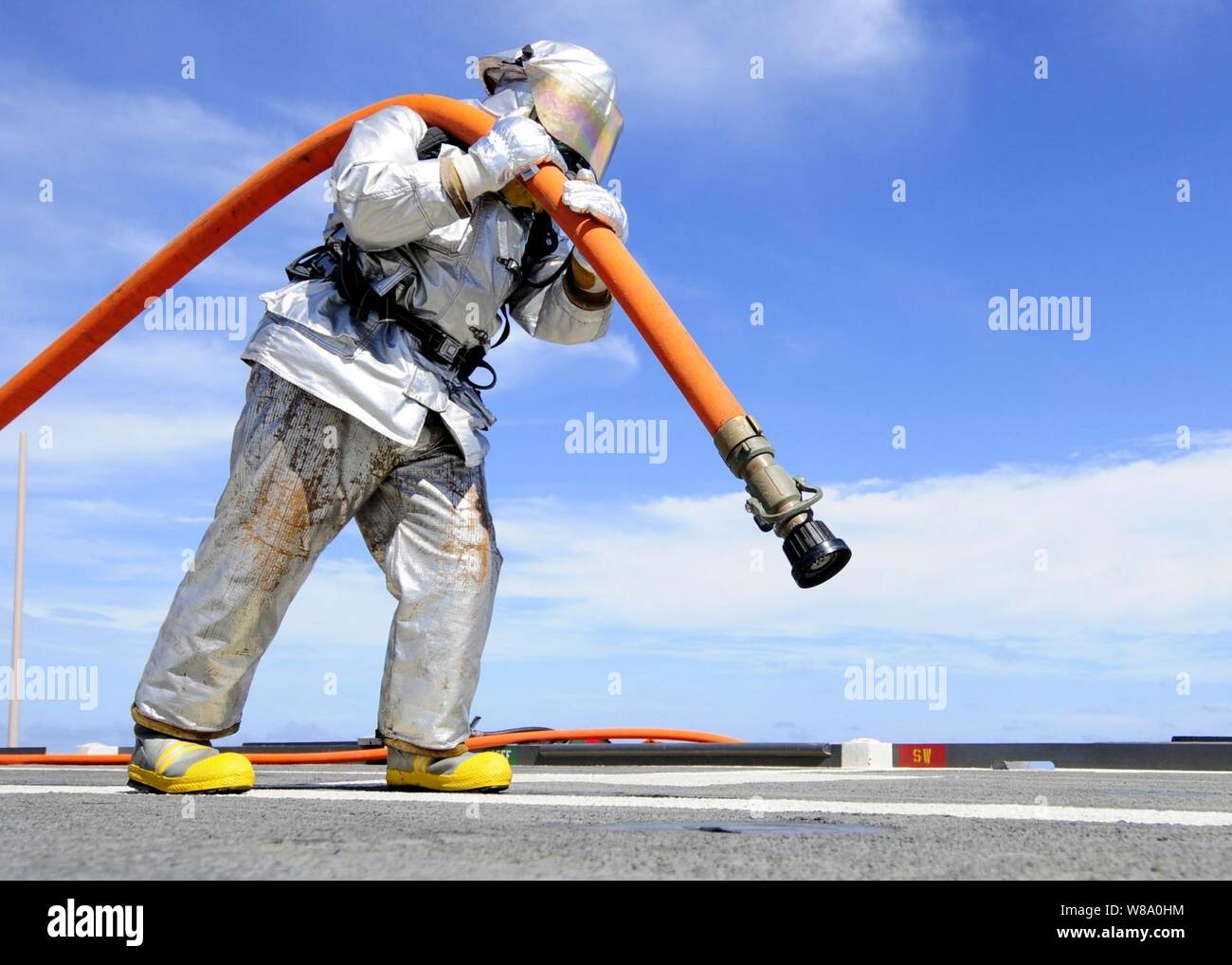 Charged fire hose hi-res stock photography and images - Alamy