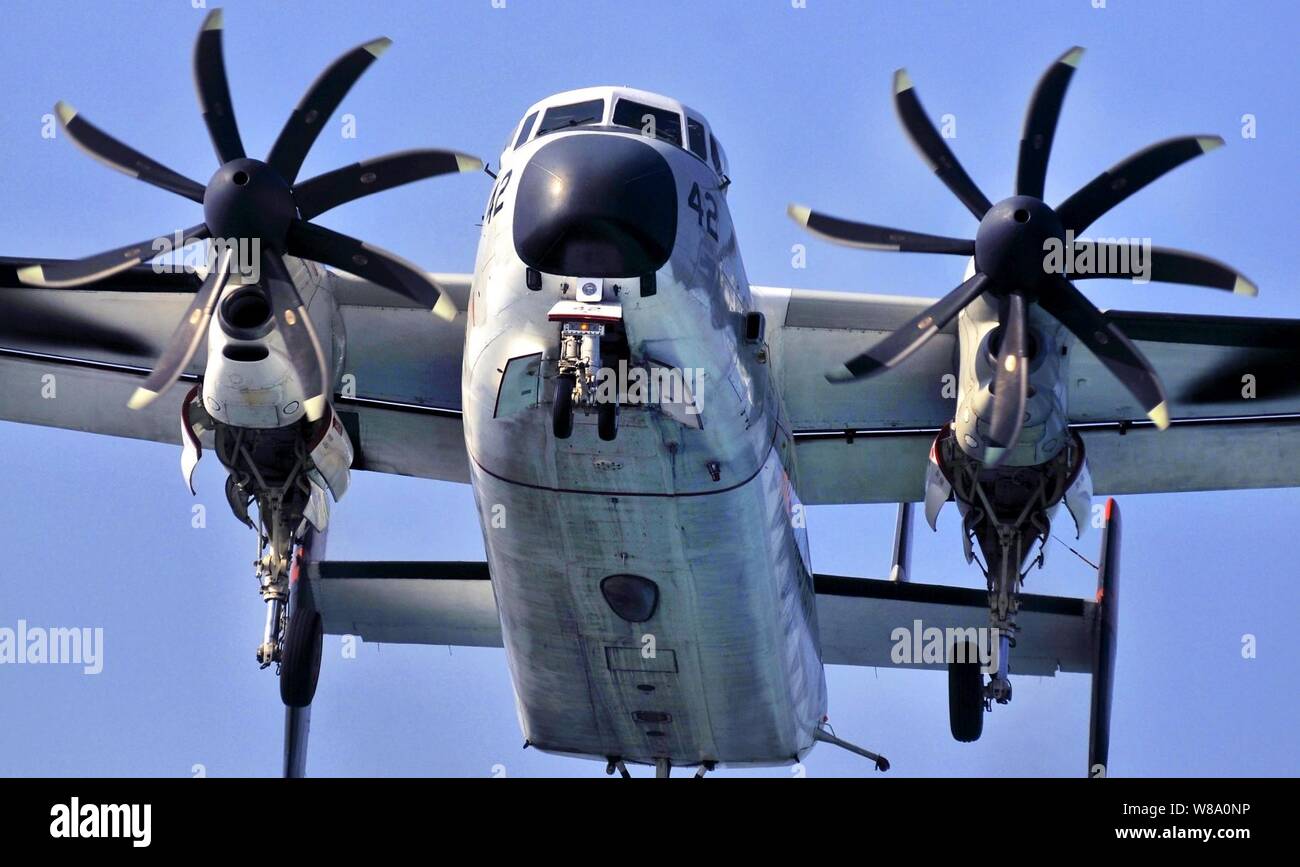 A C-2A Greyhound aircraft prepares to land on the flight deck of the ...