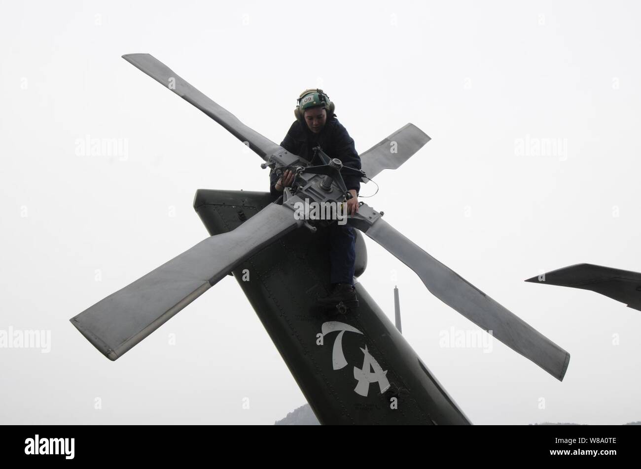 U.S. Navy Petty Officer 3rd Class Megan Walters, assigned to Helicopter ...