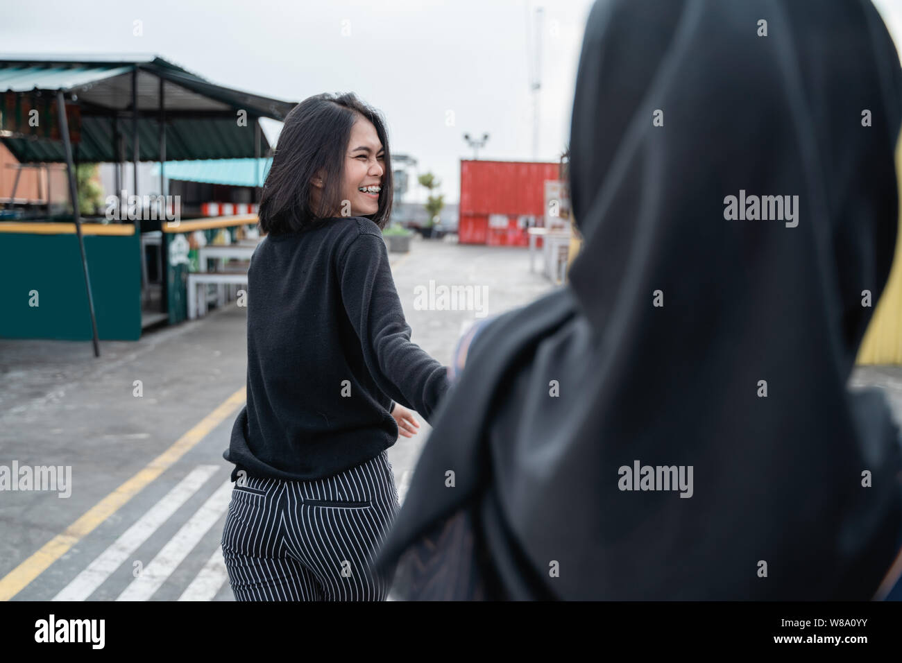 back view young woman walk away Stock Photo - Alamy