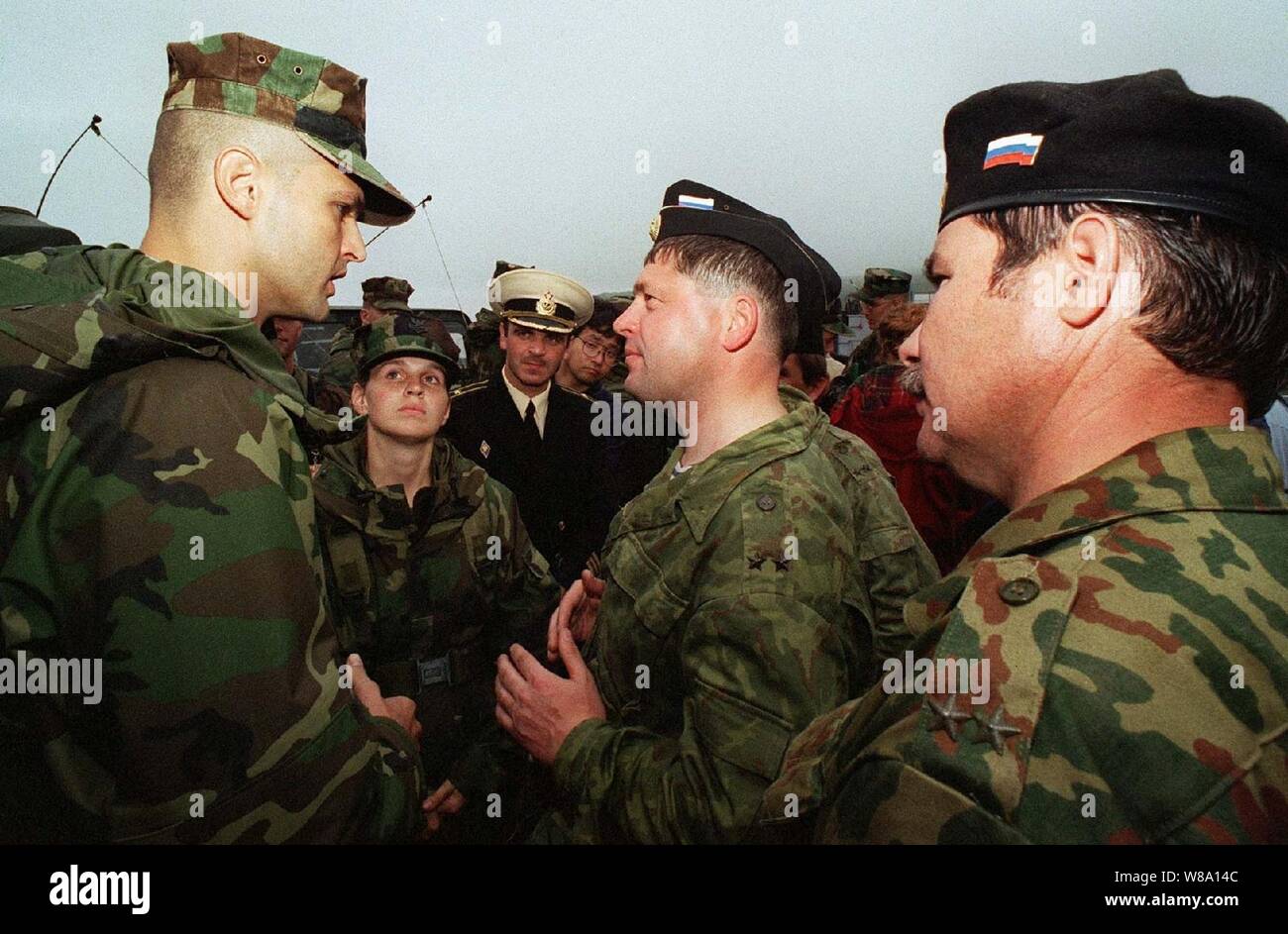 Capt. Marc McClelland (left), public affairs officer for the 31st ...
