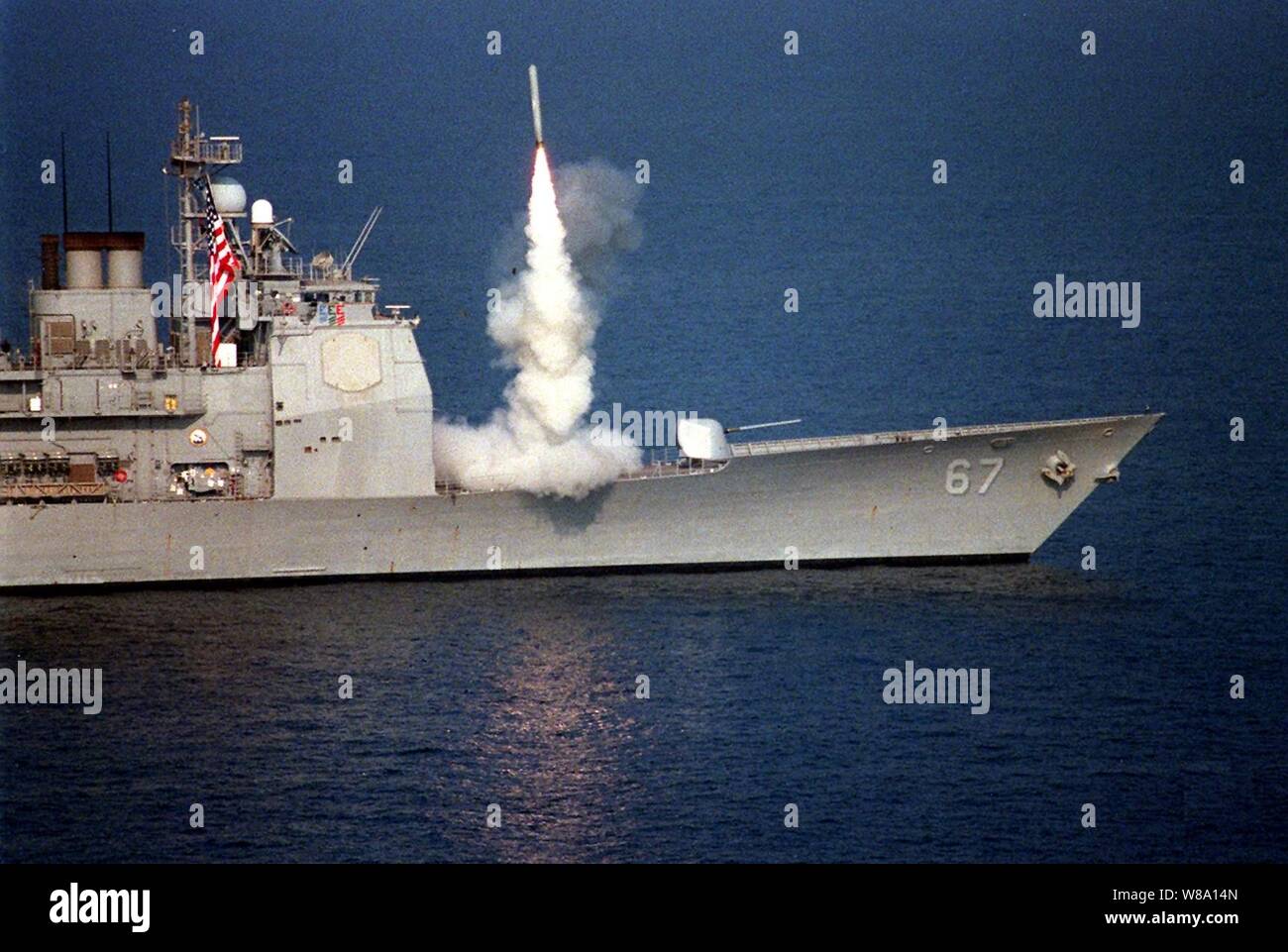 A Tomahawk cruise missile launches from the forward vertical launch ...