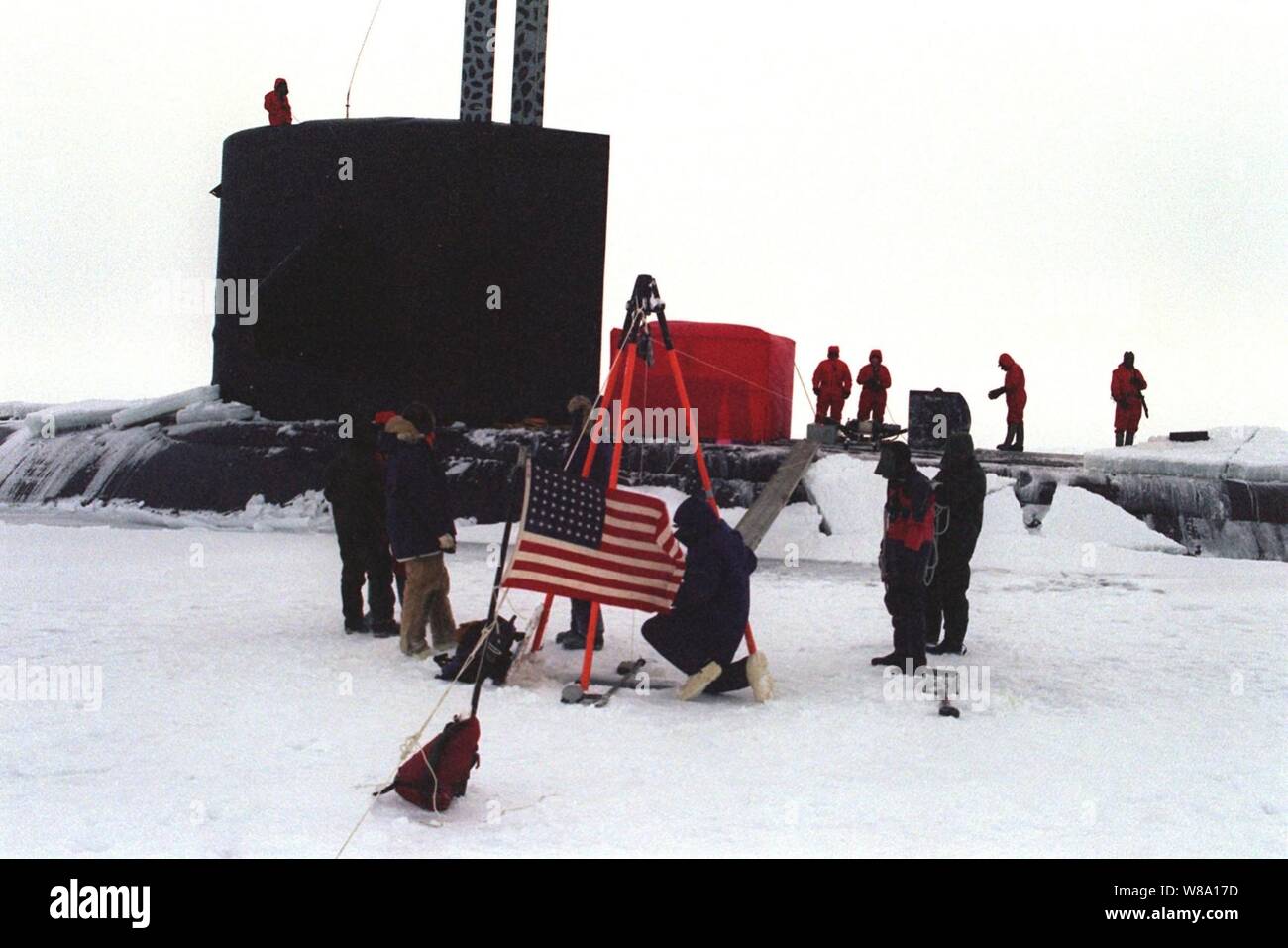 Scientists and crew members assigned to the attack submarine USS Pogy ...