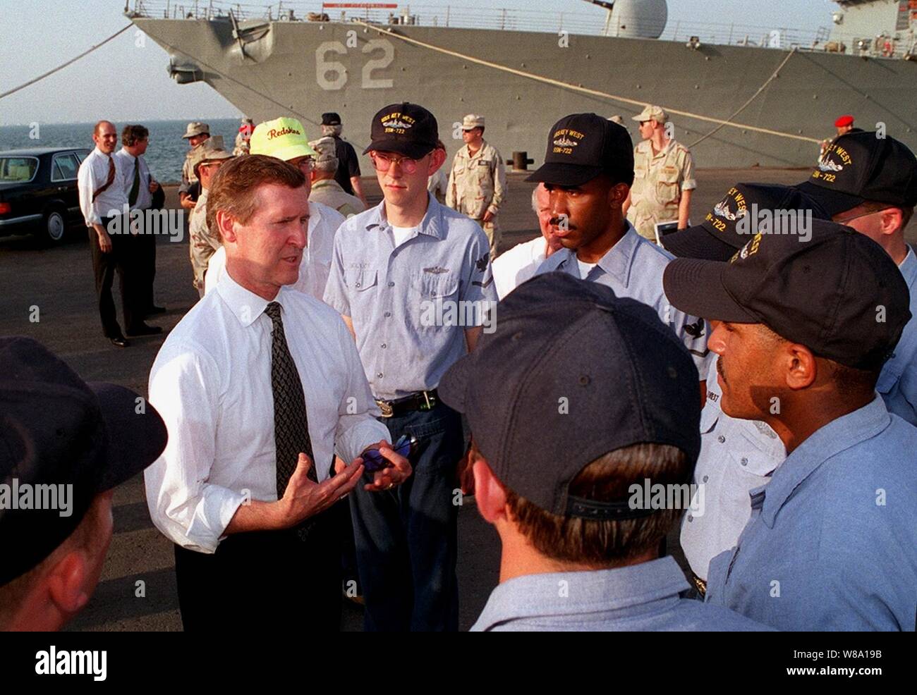 Secretary of Defense William S. Cohen speaks with sailors from the ...