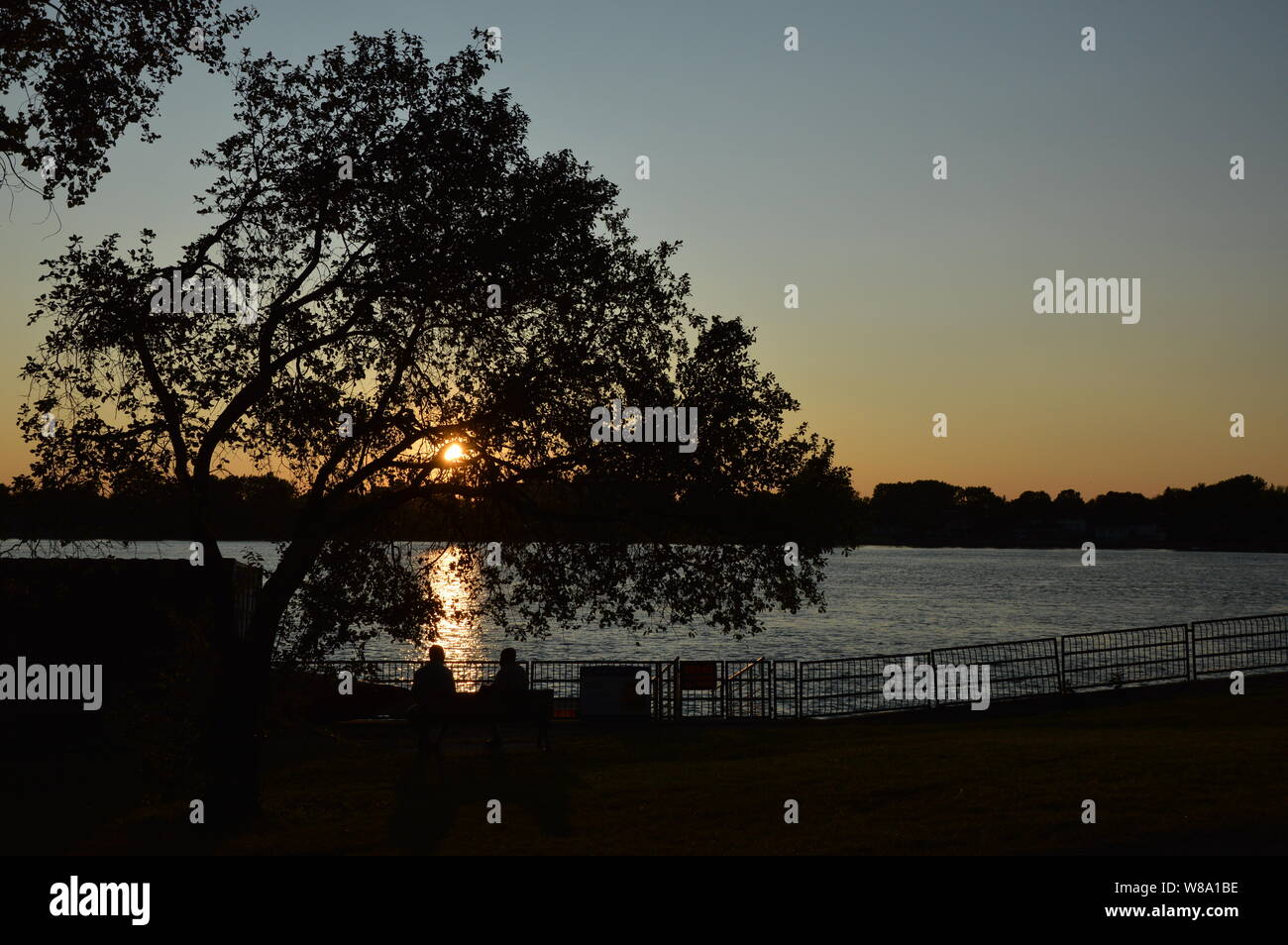 Waterfront Summer sunset Stock Photo - Alamy