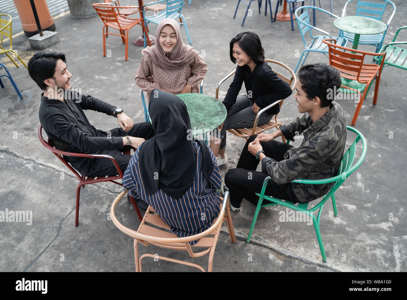 enjoy chatting and sharing with friends Stock Photo - Alamy