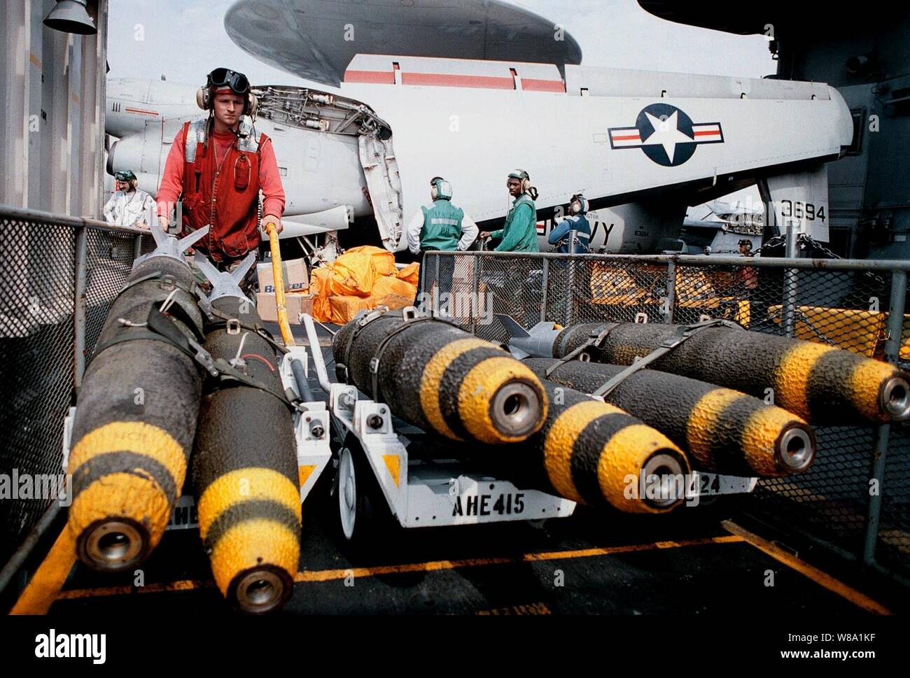 Petty Officer 3rd Class William Bailey Jr. transports MK-82 500-pound ...