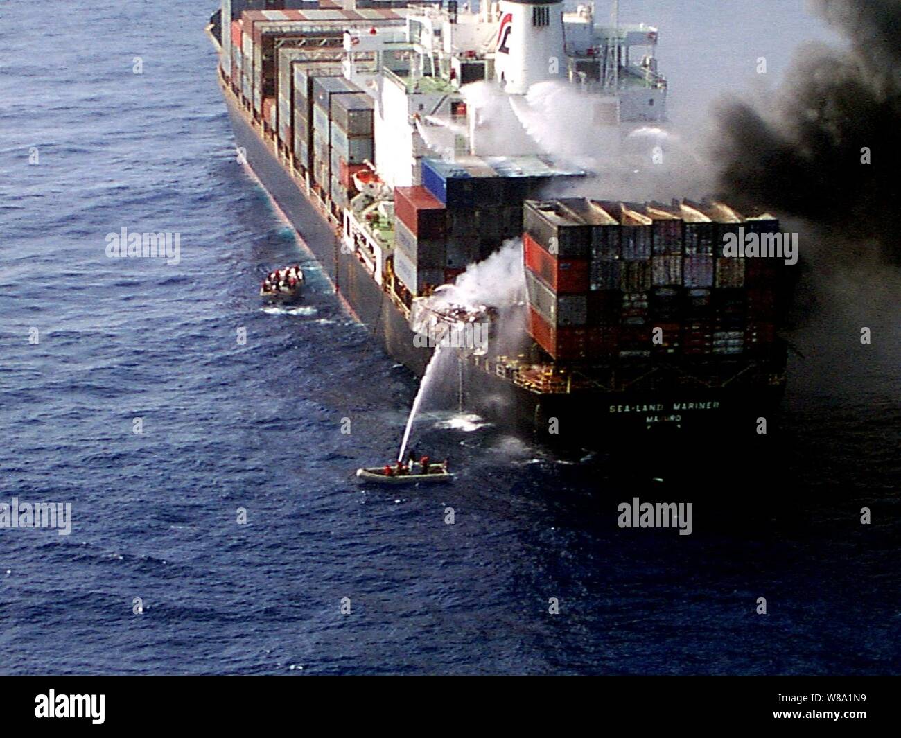 Sailors from the U.S. Navy amphibious assault ship USS Wasp (LHD 1) aim ...