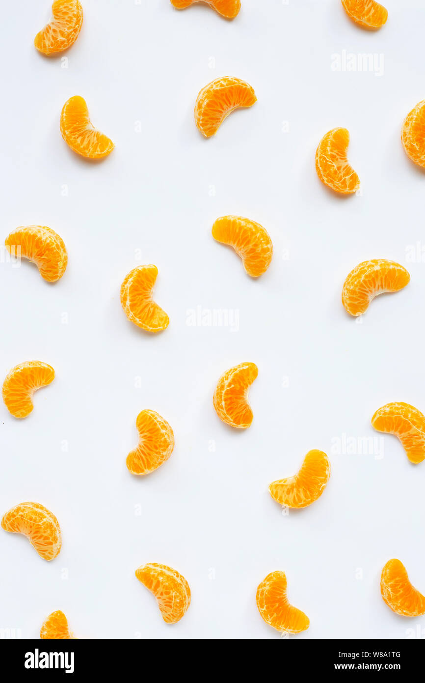 Mandarin segments, Fresh orange isolated on white background. Top view ...