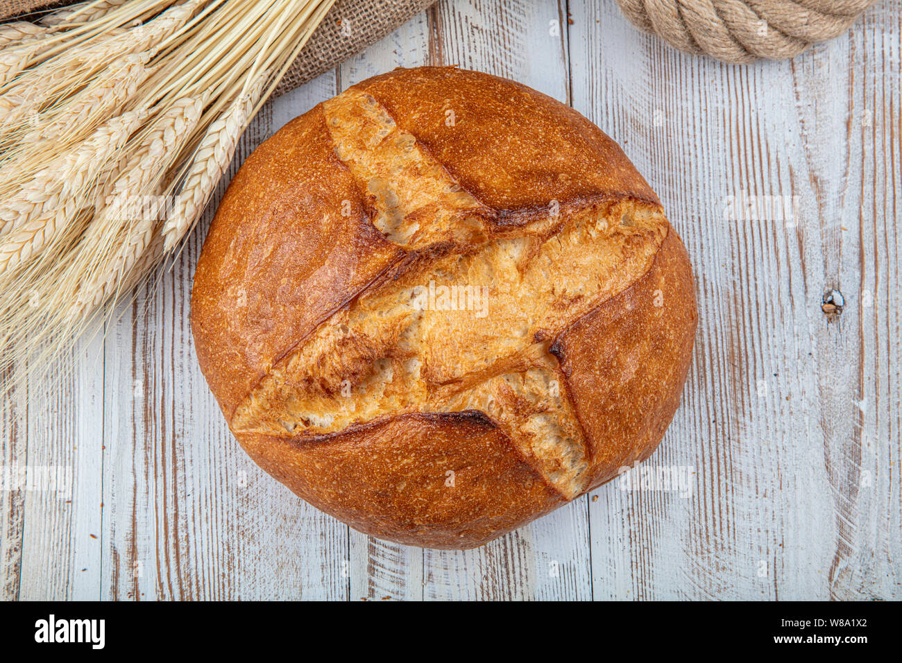 Fresh fragrant bread on the table. Food concept Stock Photo - Alamy