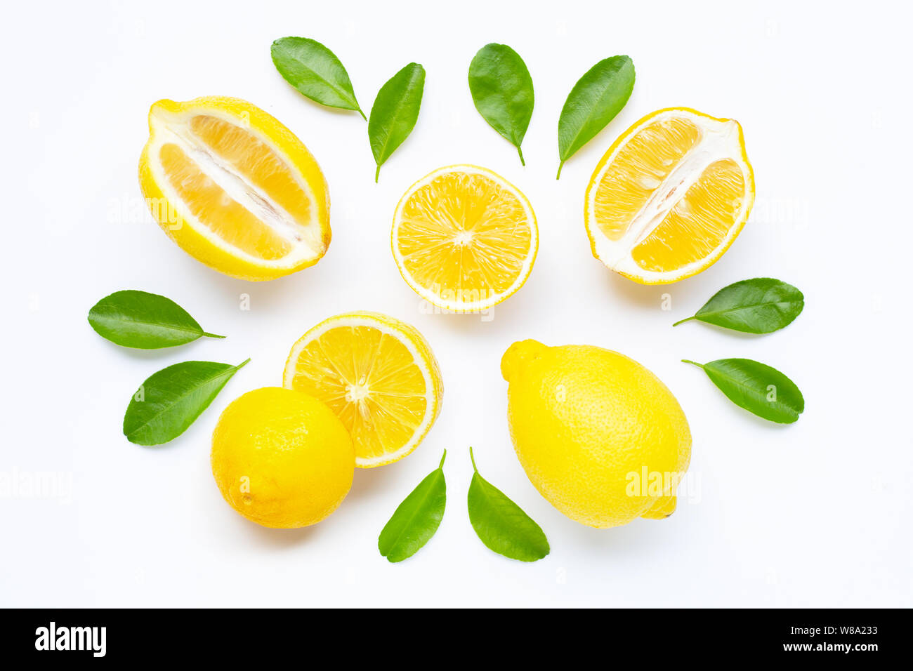 lemon and slices with leaves isolated on white background Stock Photo ...