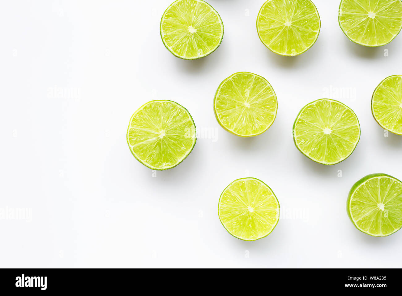 Fresh limes with on white background. Copy space Stock Photo - Alamy
