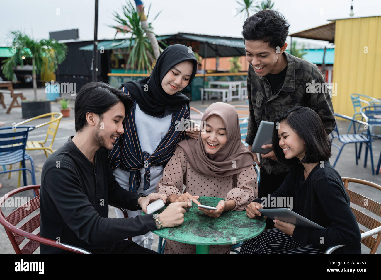 Having fun with handphone Stock Photo - Alamy