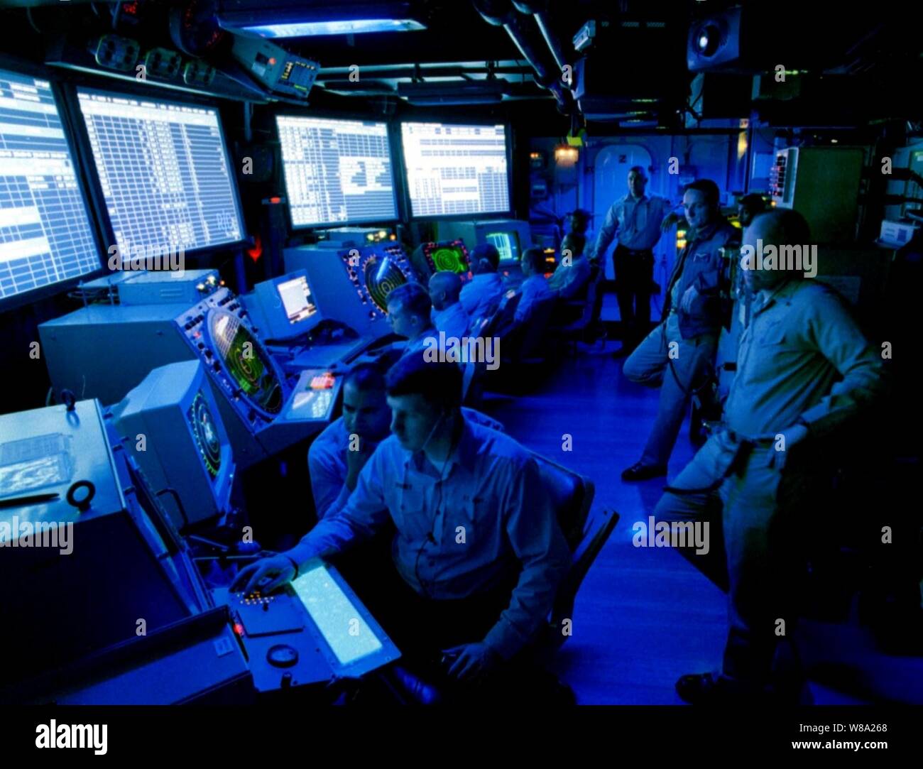 U.S. Navy air traffic controllers man the radar screens of the Air ...