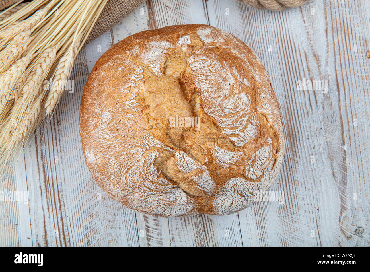Fresh fragrant bread on the table. Food concept Stock Photo - Alamy