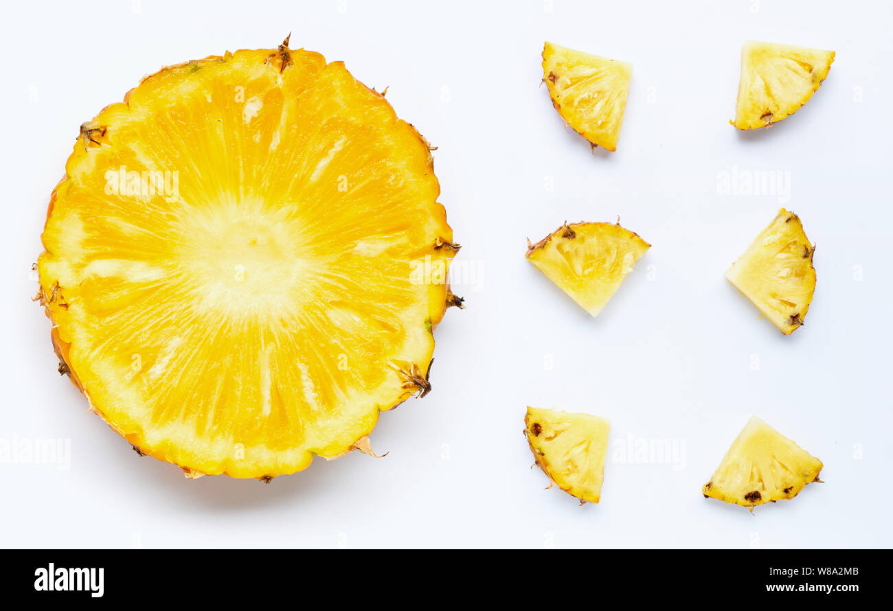 Pineapple slices on white background Stock Photo - Alamy