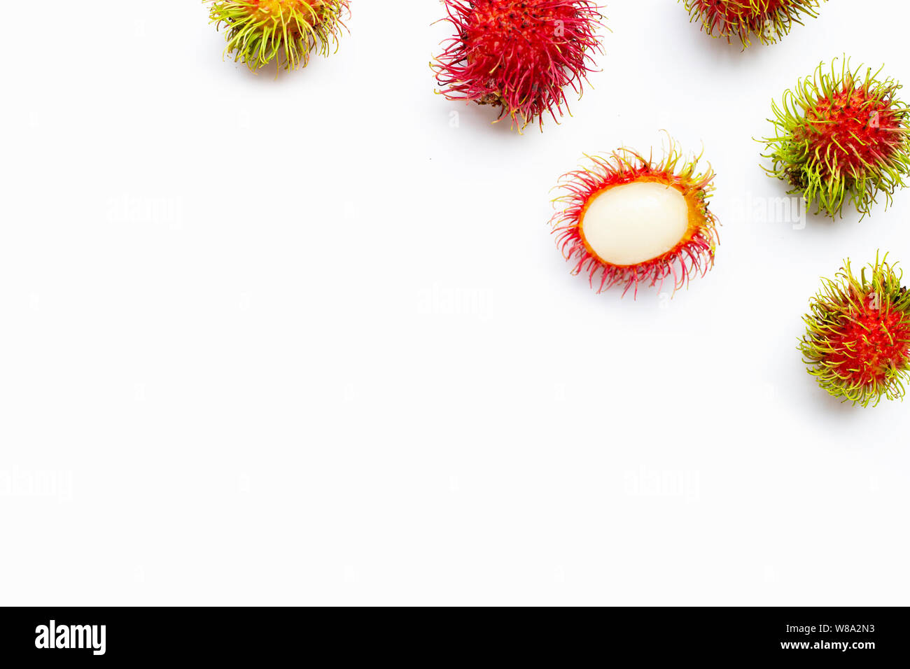 Rambutan isolated on whitbackground. Top view Stock Photo - Alamy