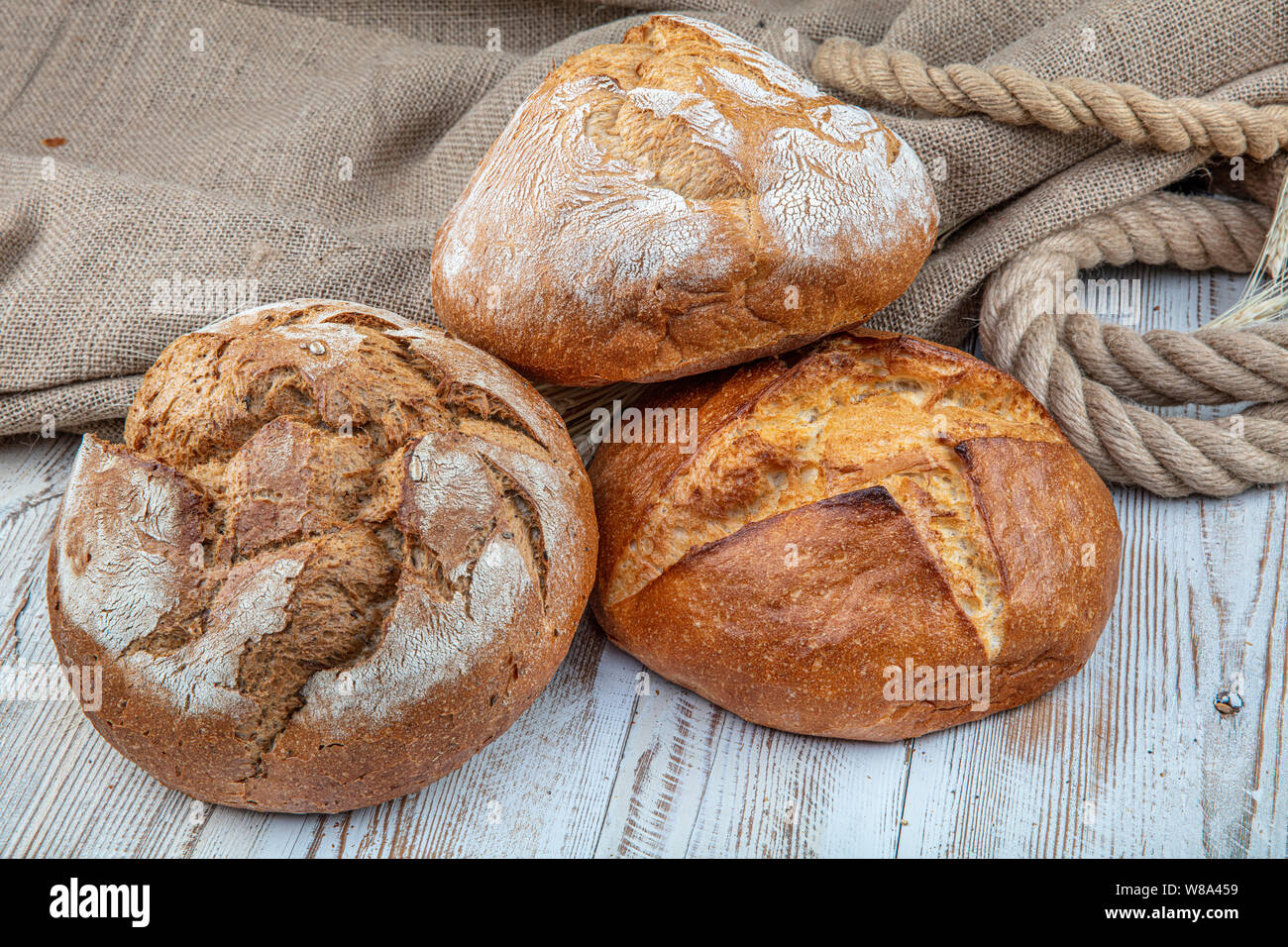 Fresh fragrant bread on the table. Food concept Stock Photo - Alamy