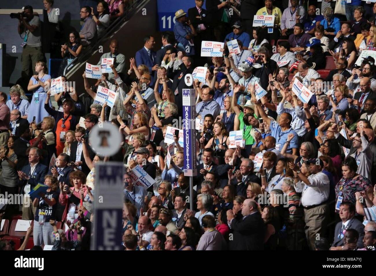 Delegates watch and cheer as the roll call votes are cast at the ...