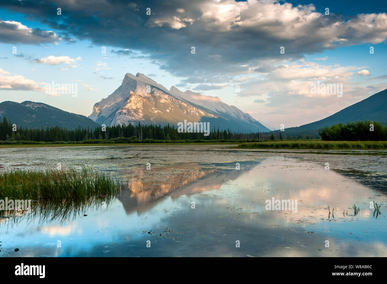 Rundle Mountain reflecting in the Vermillion Lakes in Banff National ...