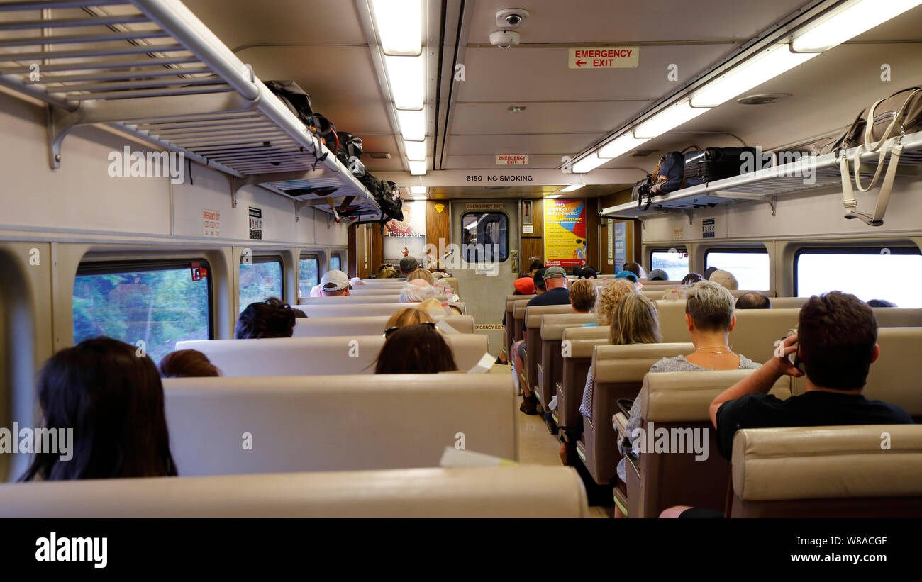 On board a Metro North train car travelling on the Hudson Line along the Hudson River in New ...