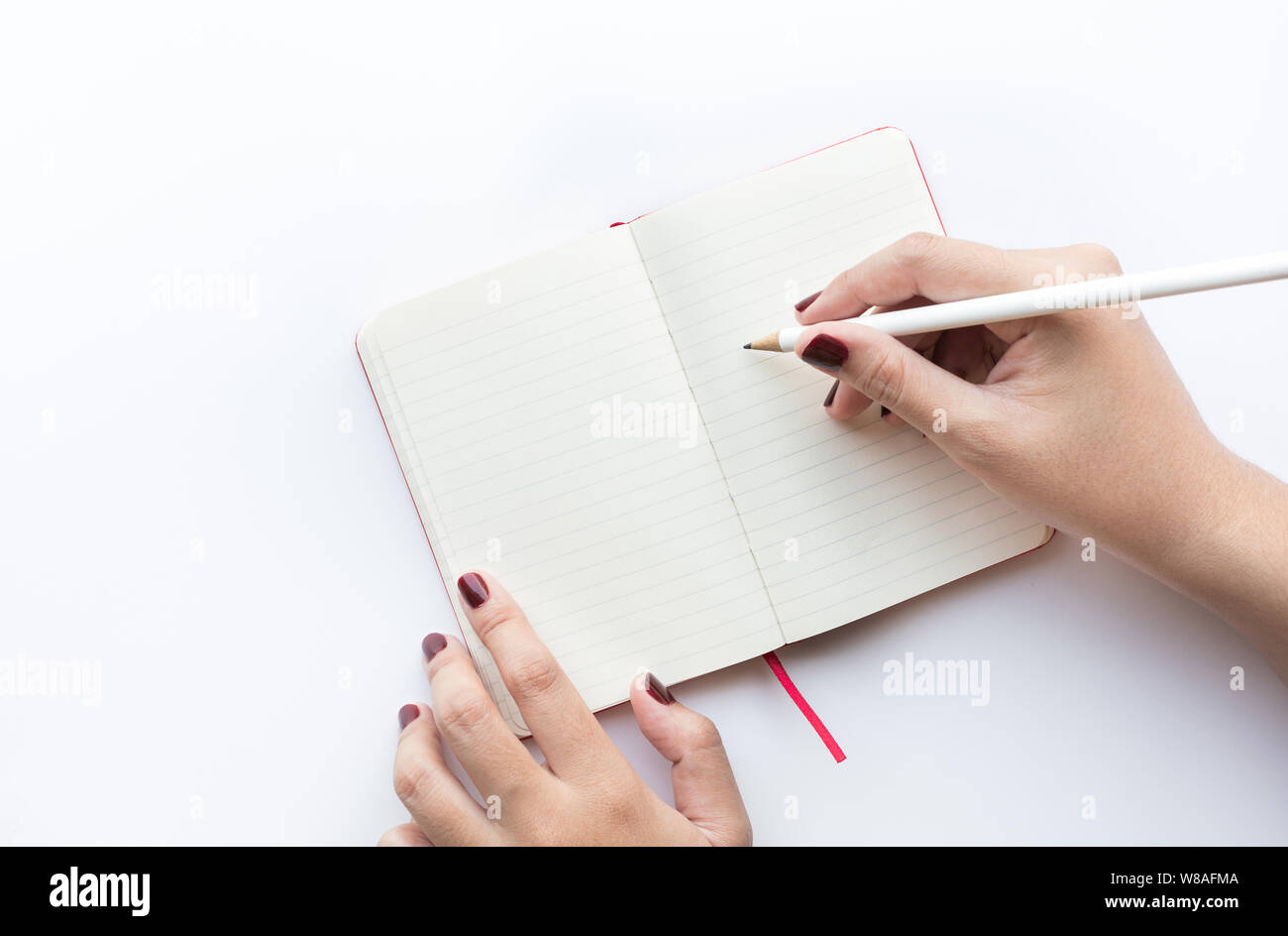 Female hand writing on notepad.idea and inspiration concepts ideas ...